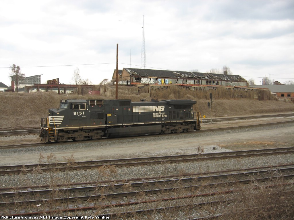 NS 9151 waiting for a light engine move on the CSX